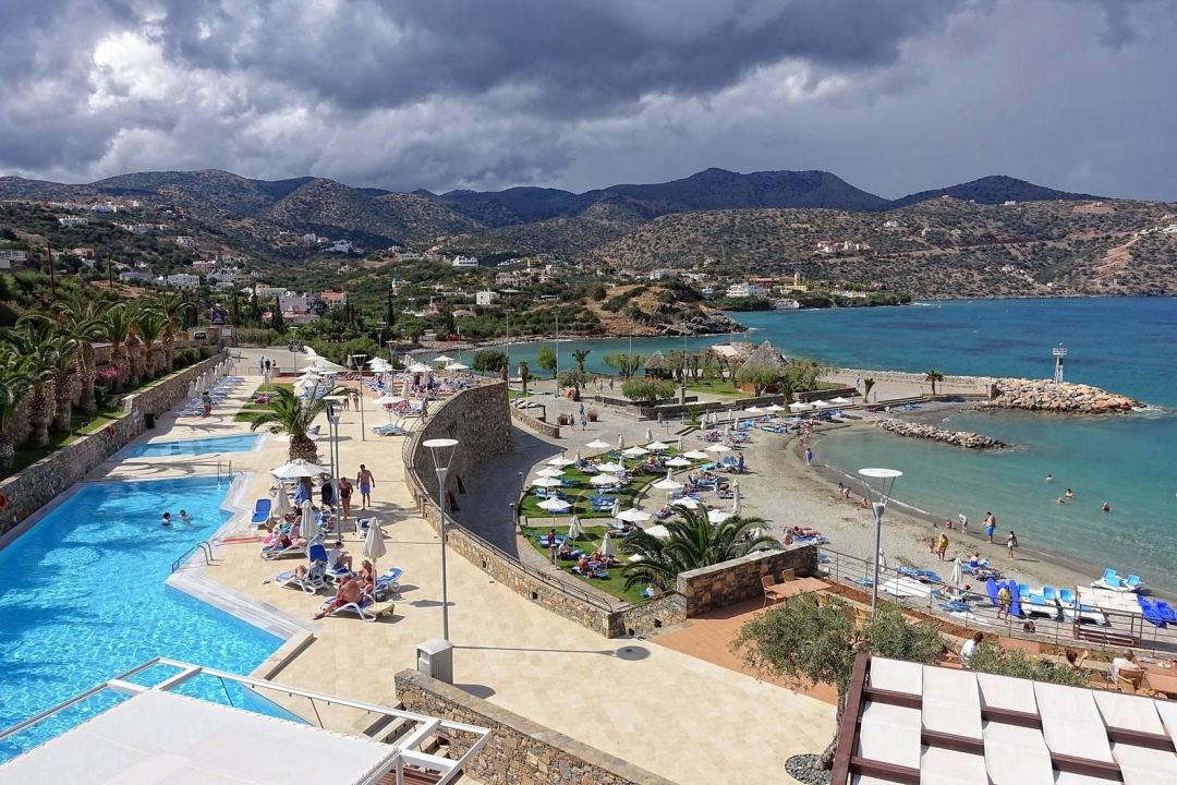 "Blick zum Pool und Strand vom Balkon" Wyndham Grand Crete Mirabello ...