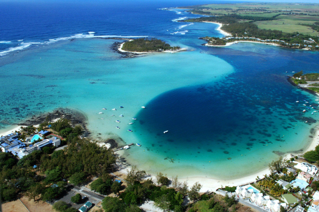 "Aeriel view of Blue Lagoon and its surroundings" Le Peninsula Bay ...