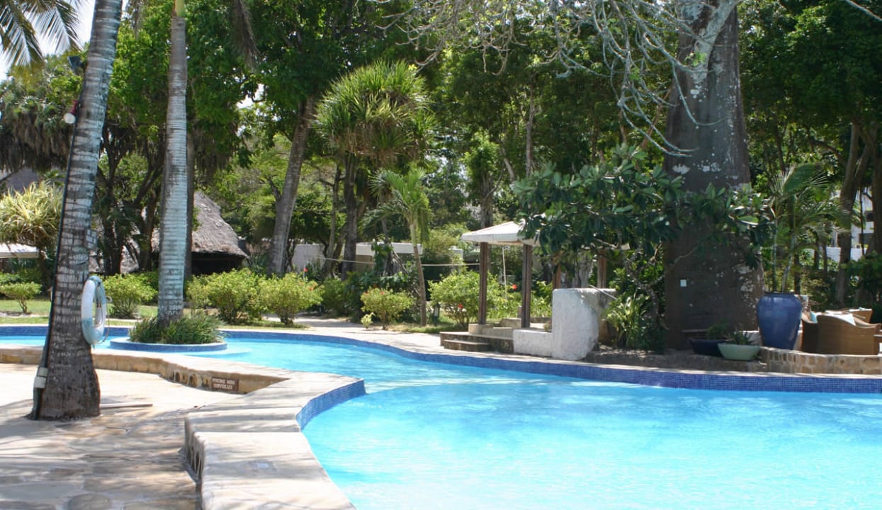 "The pool extends into the..." Ocean Village Club (Diani Beach ...